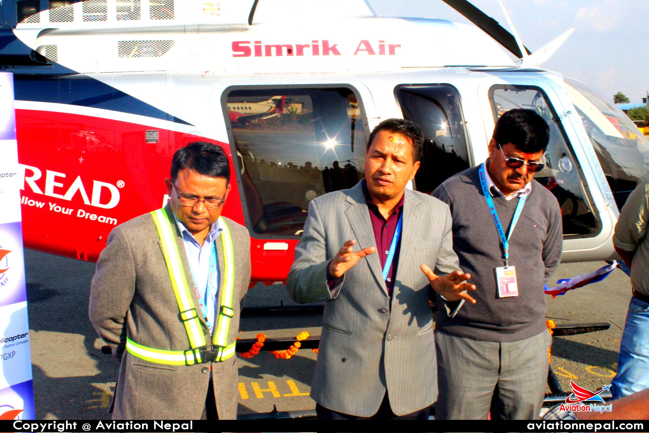 Simrik air’s Bell 407 reaches the east helipad TIA with PHOTO FEATURE