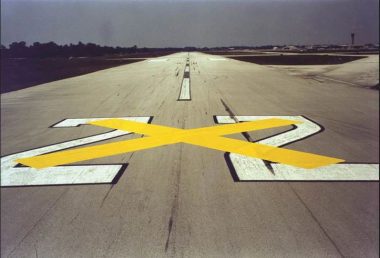 Airport markings and signs used to ensure safe landing and taxing