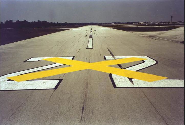 Airport markings and signs used to ensure safe landing and taxing